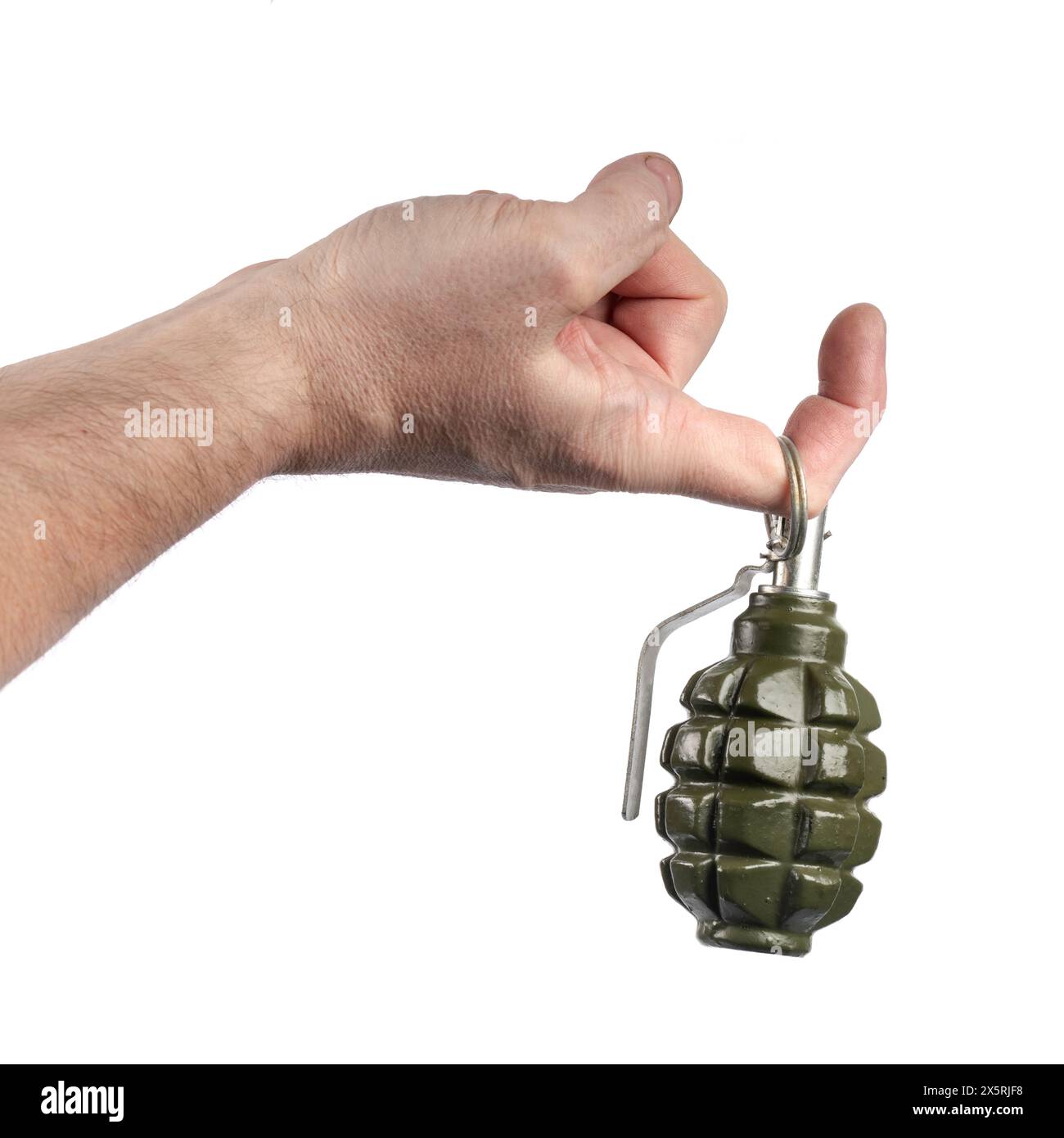 Man`s hand holds on finger the old green shrapnel Hand Grenade Weapon ...