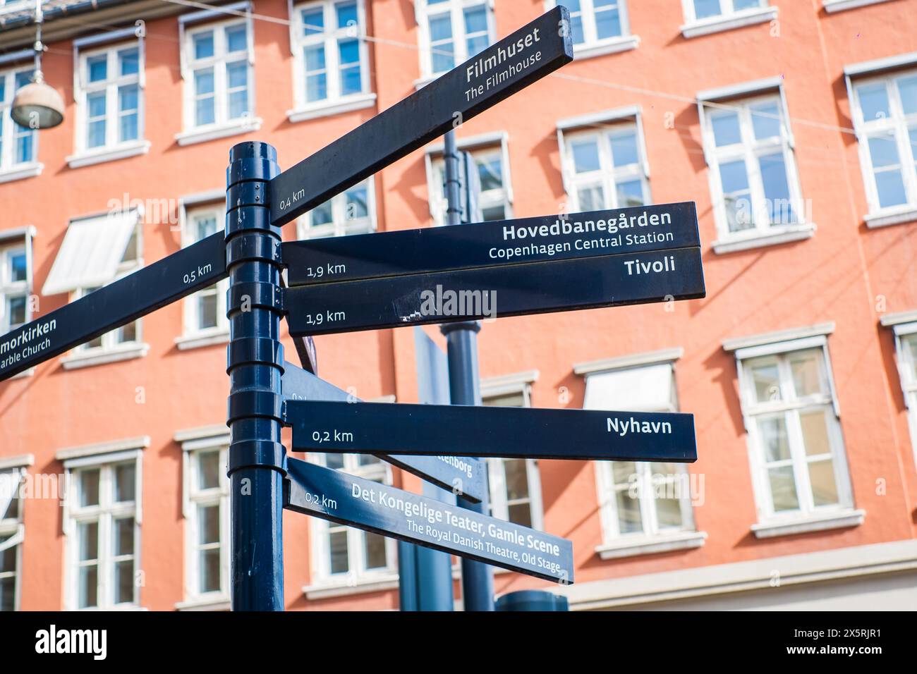 Copenhagen, Denmark - April 6, 2024: Directional signpost, arrows ...