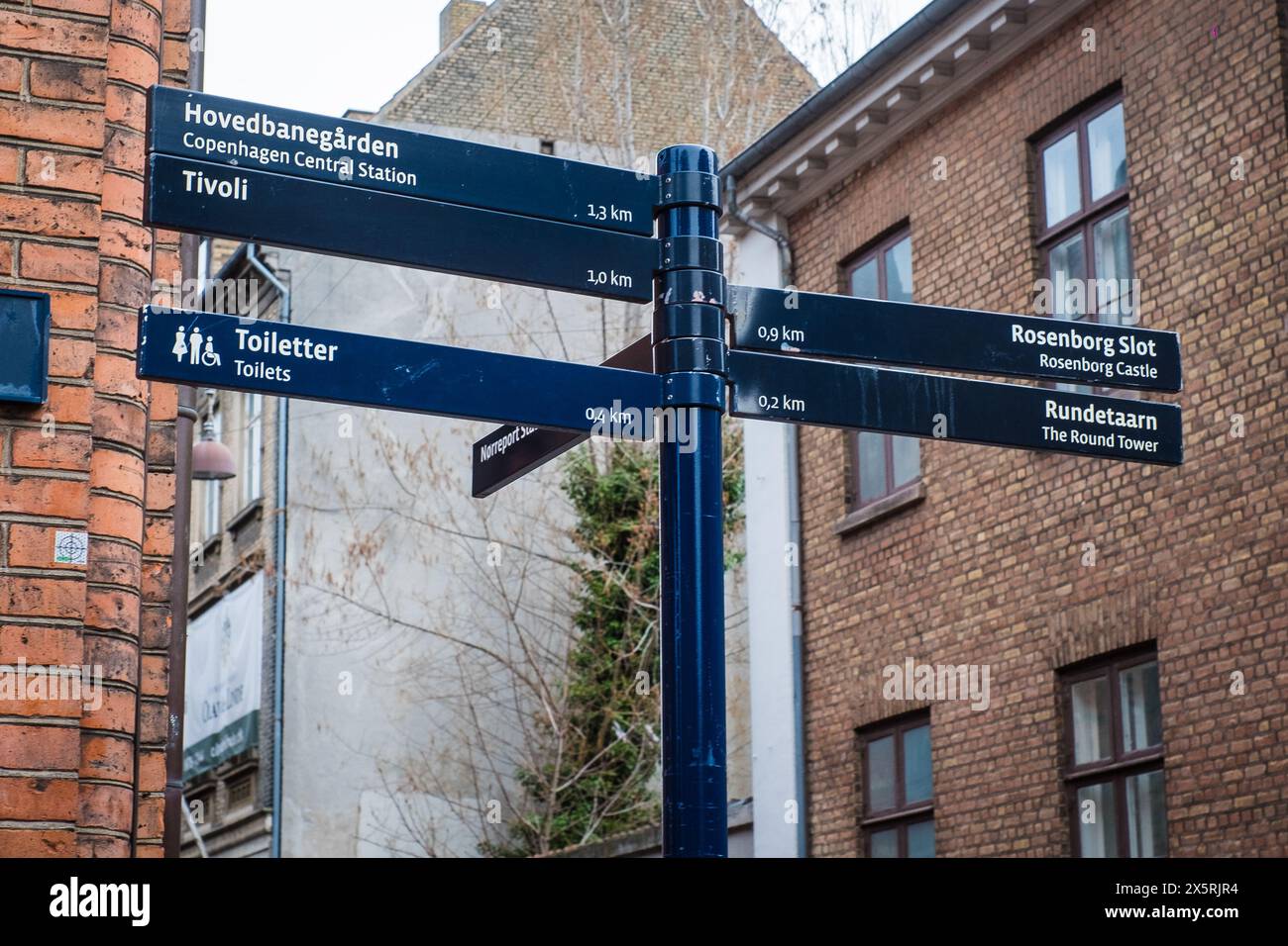 Copenhagen, Denmark - April 6, 2024: Directional signpost, arrows ...