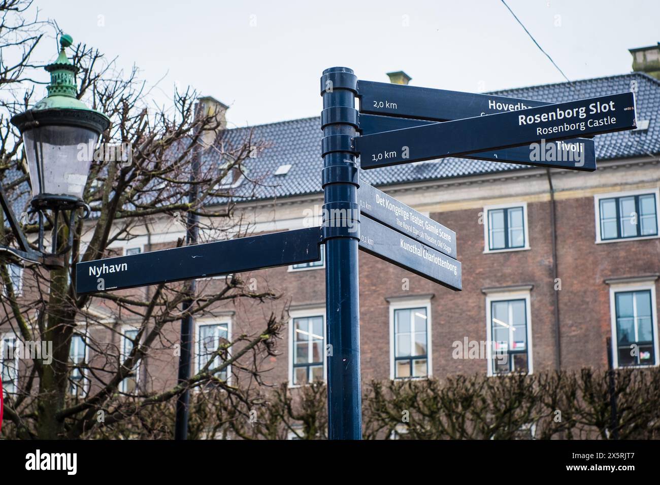 Copenhagen, Denmark - April 6, 2024: Directional signpost, arrows ...