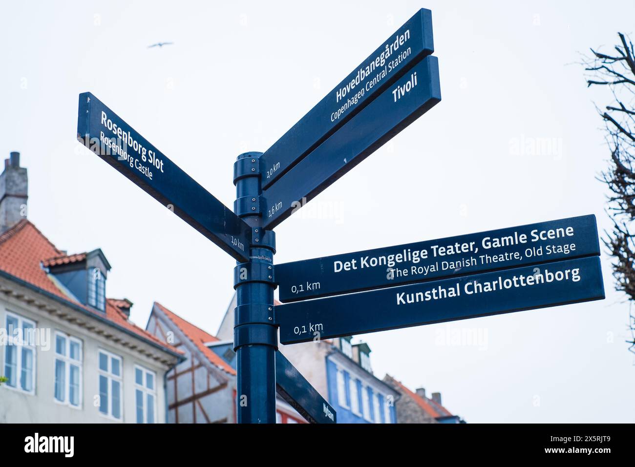 Copenhagen, Denmark - April 6, 2024: Directional signpost, arrows ...