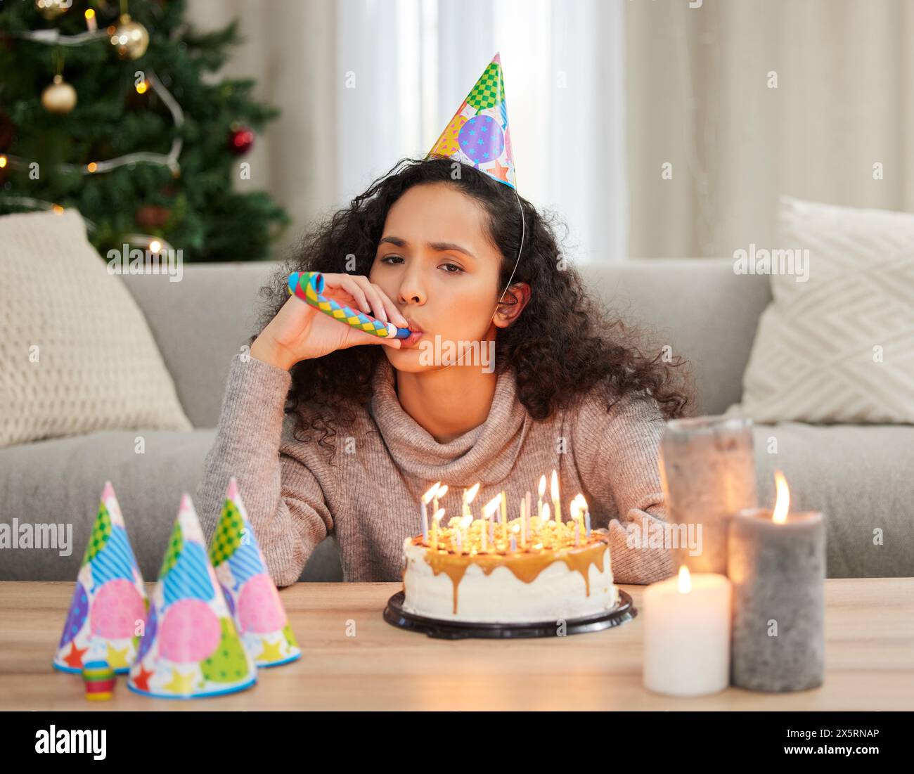 Woman, celebrate and unhappy birthday in home, sad and grief for ...