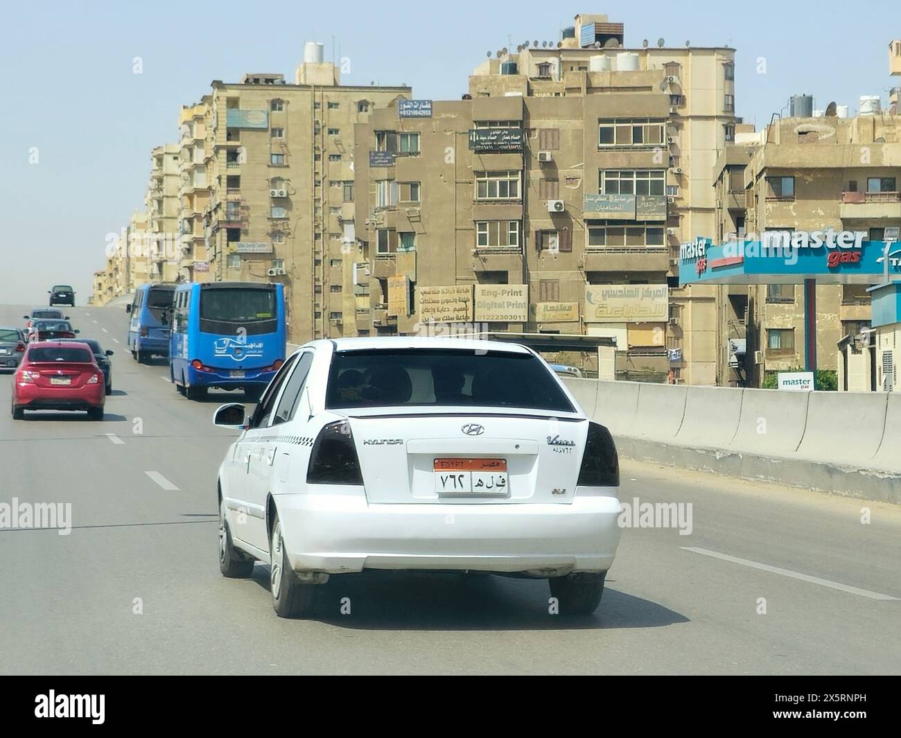 Cairo, Egypt, March 31 2024: Cairo is served by its white taxis which ...