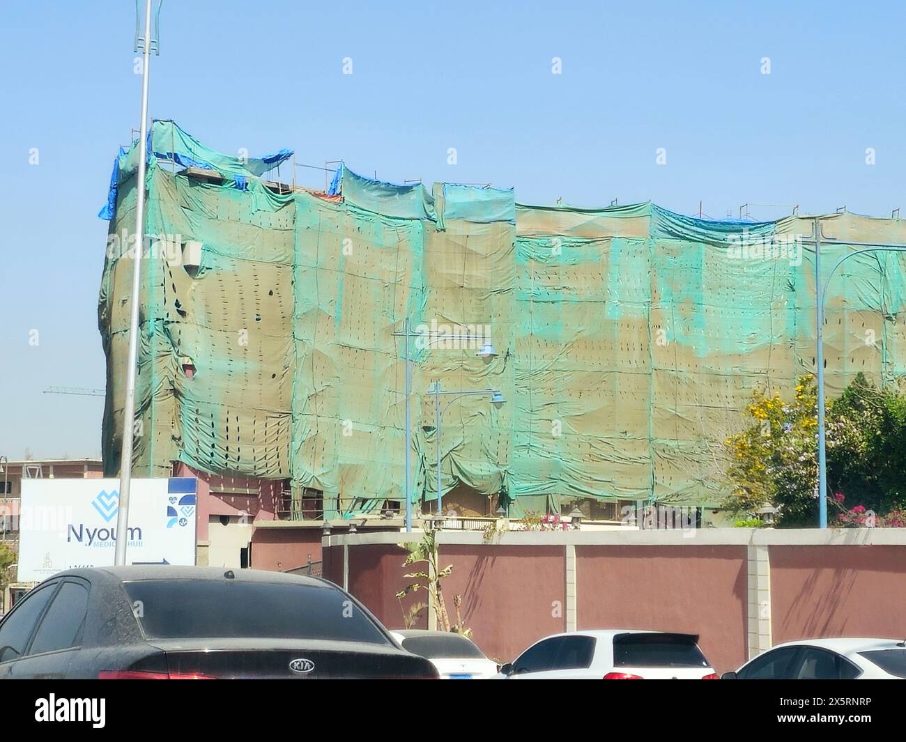 Cairo, Egypt, April 4 2024: Nyoum medical hub, a covered building that ...