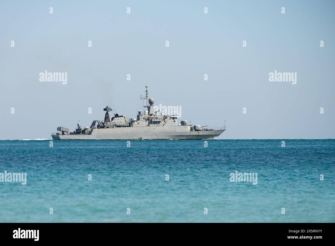 Frigate of Royal Thai Navy sails along sea blue sky no people ...