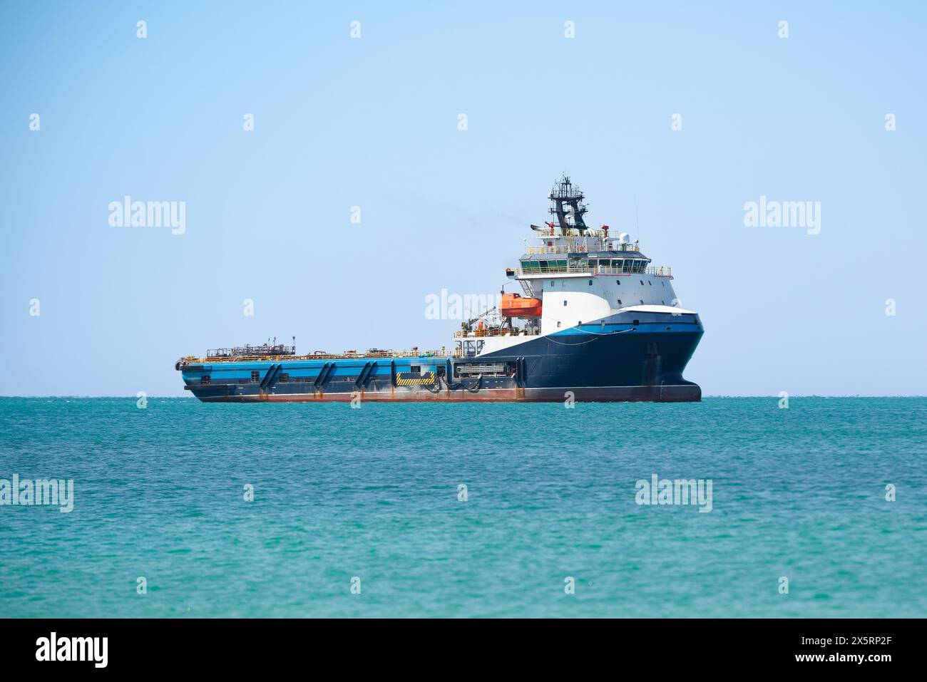 Floating maritime cargo tanker vessel ferry in the sea Thailand blue ...