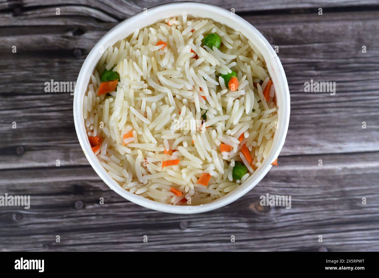 Traditional Chinese food, long grain white Basmati rice with vegetables ...