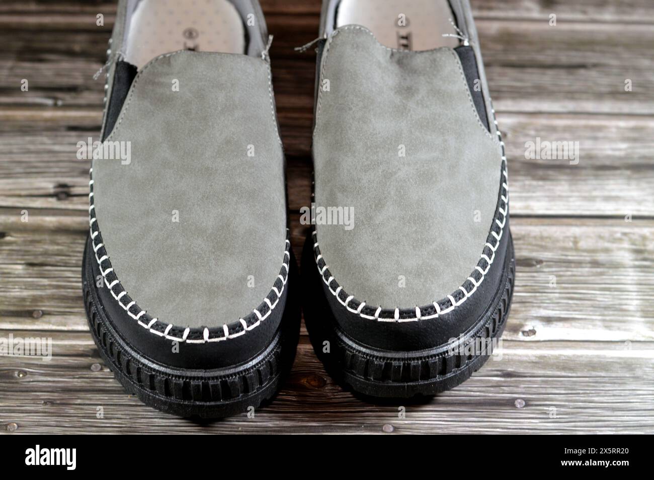 Cairo, Egypt, April 1 2024: men casual grey shoes, a shoe is an item of ...