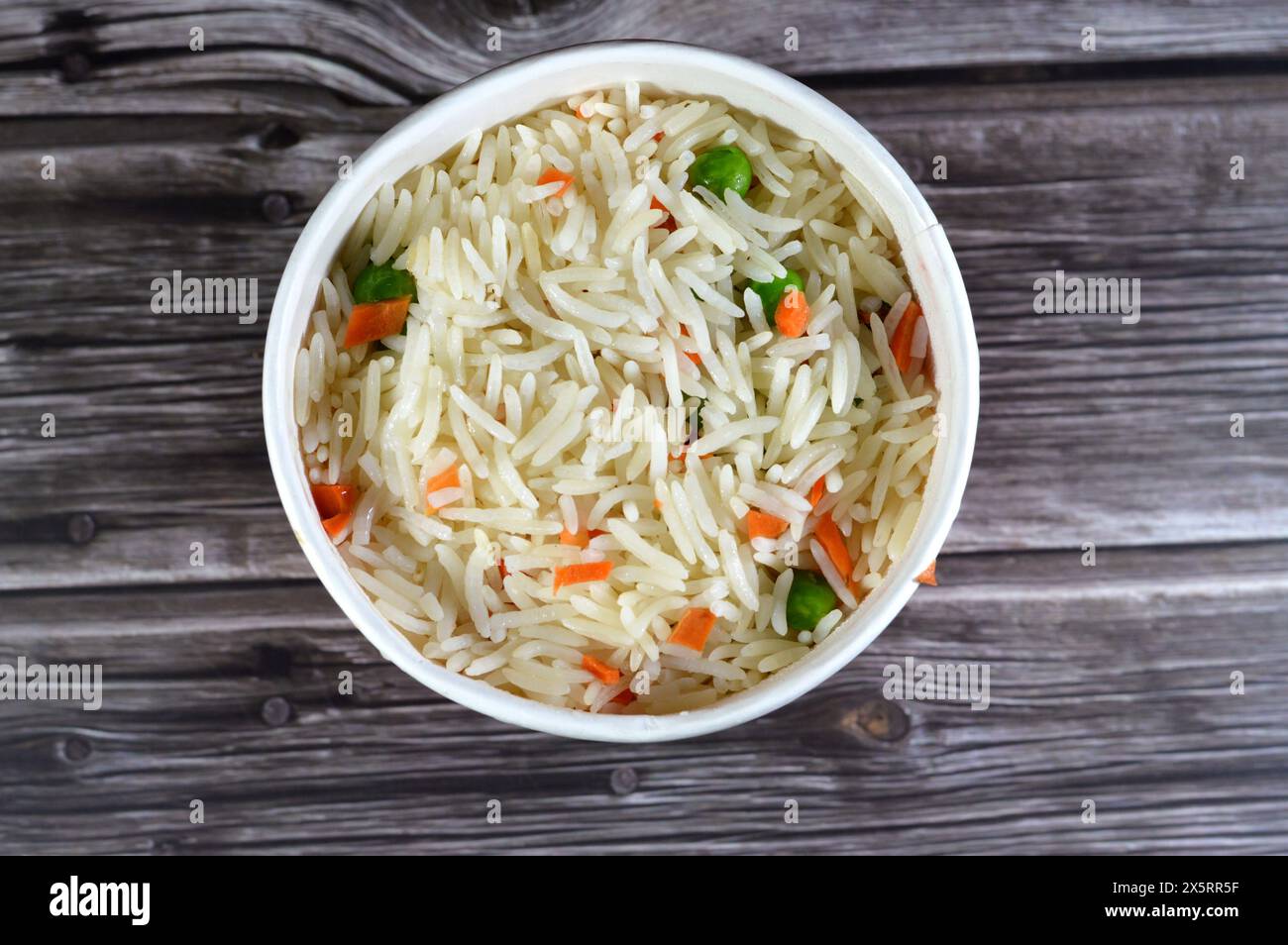 Traditional Chinese food, long grain white Basmati rice with vegetables ...