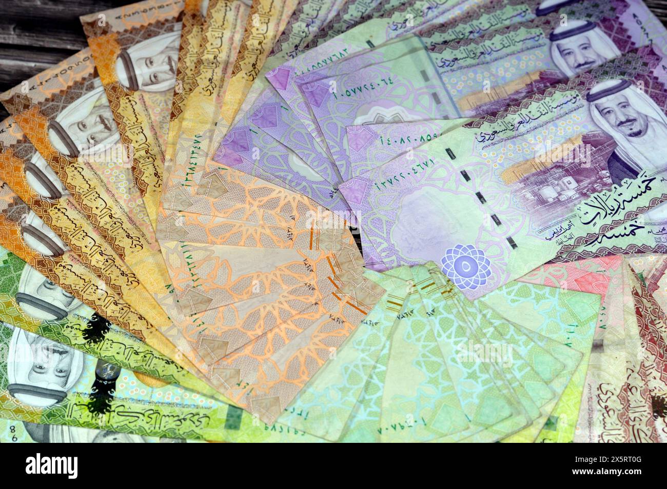 Background Of Saudi Arabia Money Banknotes Bill Of Different Values 100 50 10 And 5 Riyals Of