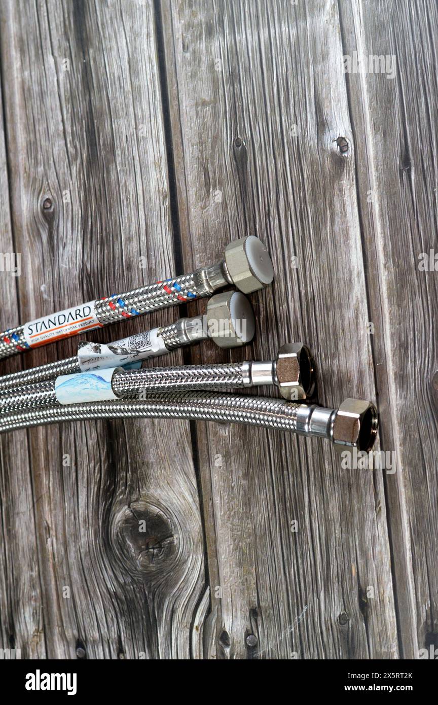 Cairo, Egypt, April 16 2024: water tube pipelines, braided flexible ...