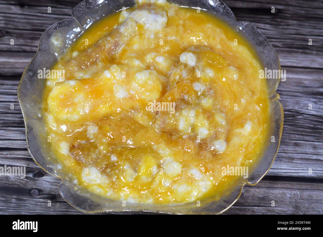 A sweet mixture dessert of rice pudding, milk cream qishta, basbousa ...