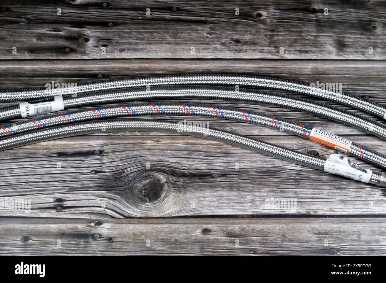 Cairo, Egypt, April 16 2024: water tube pipelines, braided flexible ...