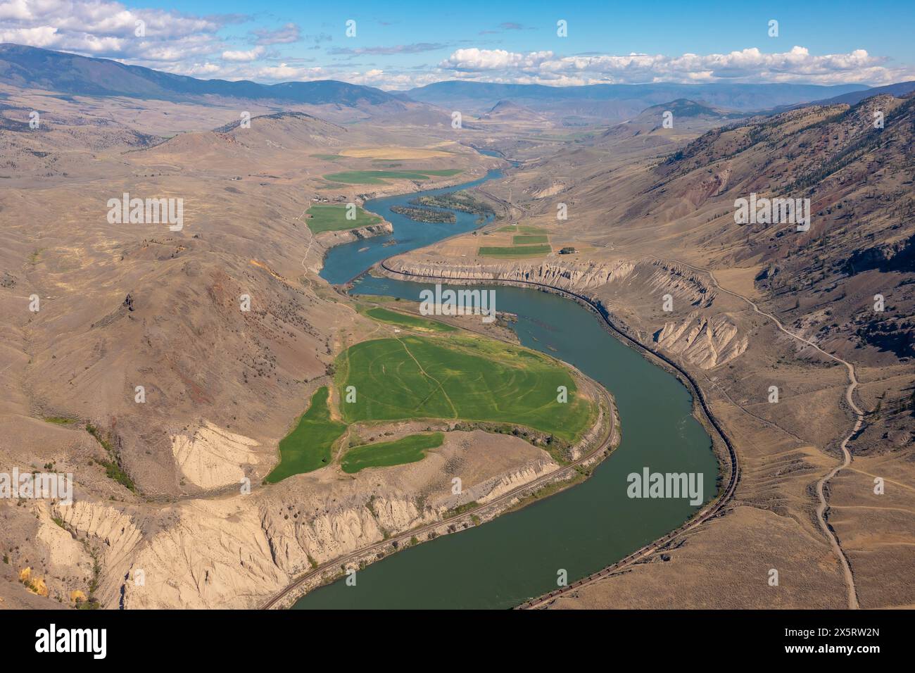 Vertical view surface of river among the mountains. Aerial photo from ...