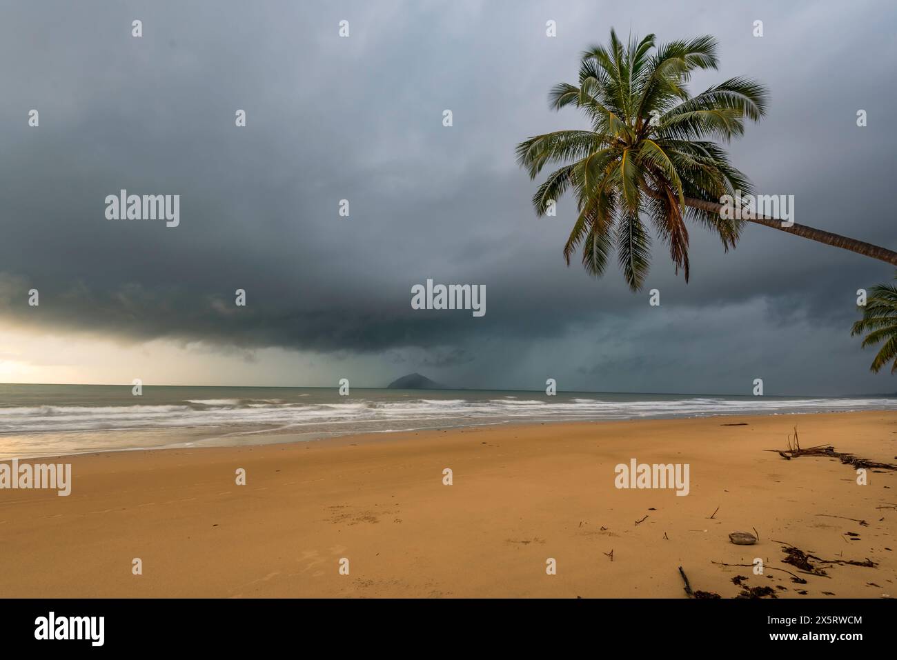 A tropical rain storm and heavy low grey clouds approaching Mission ...