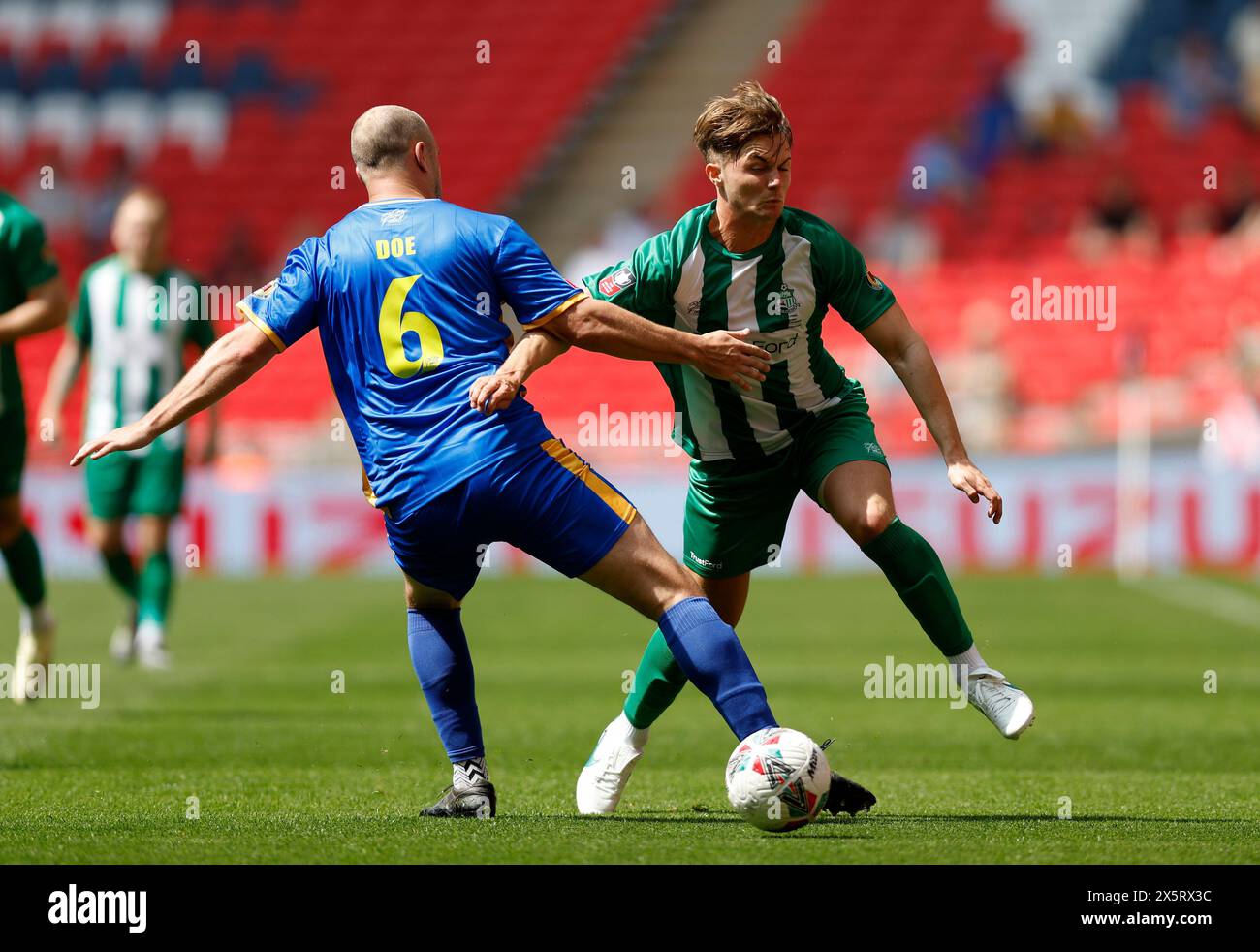 Great Wakering Rovers FC's Callum Boylan is fouled by Romford's Scott ...