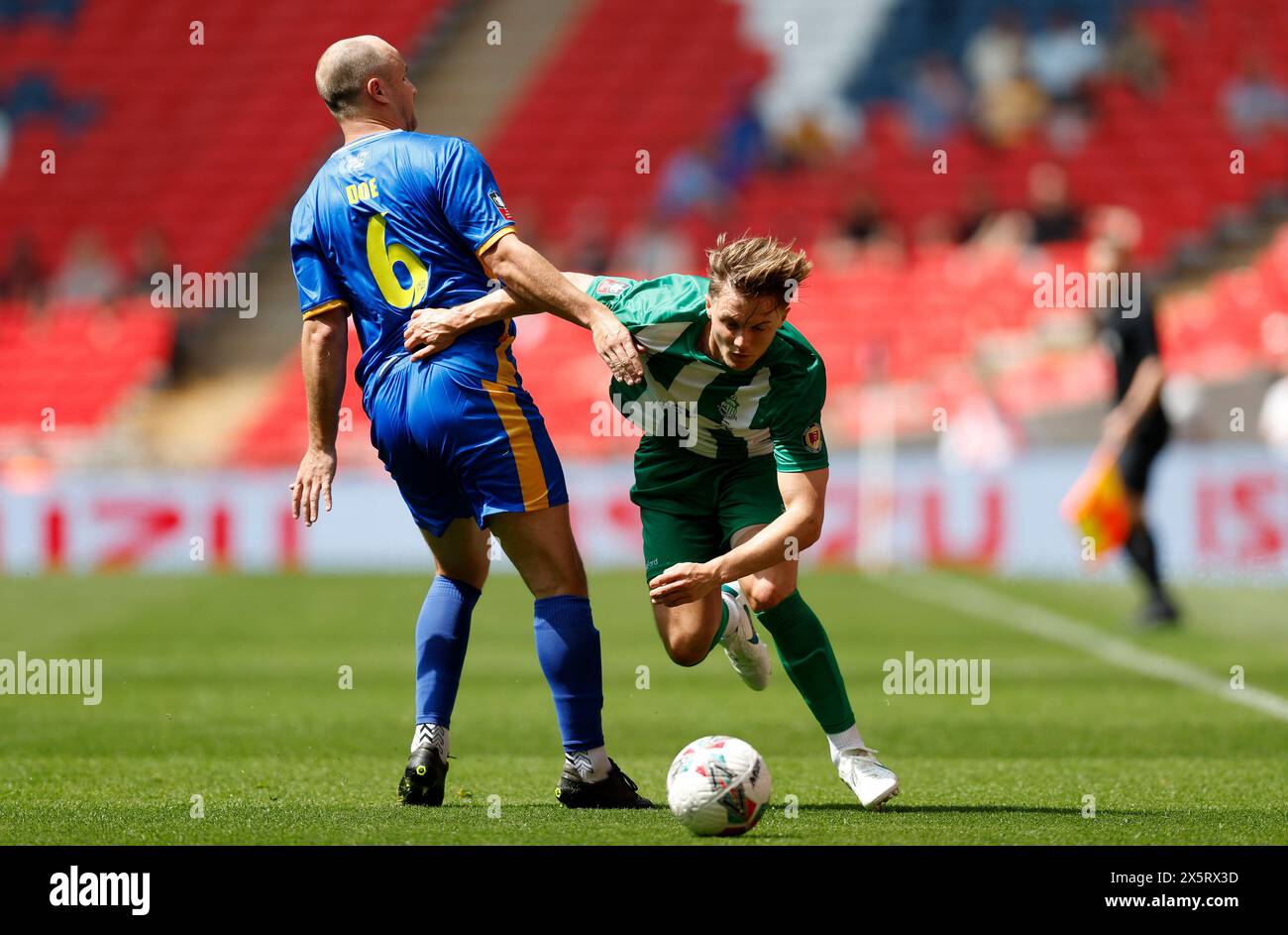 Great Wakering Rovers FC's Callum Boylan is fouled by Romford's Scott ...