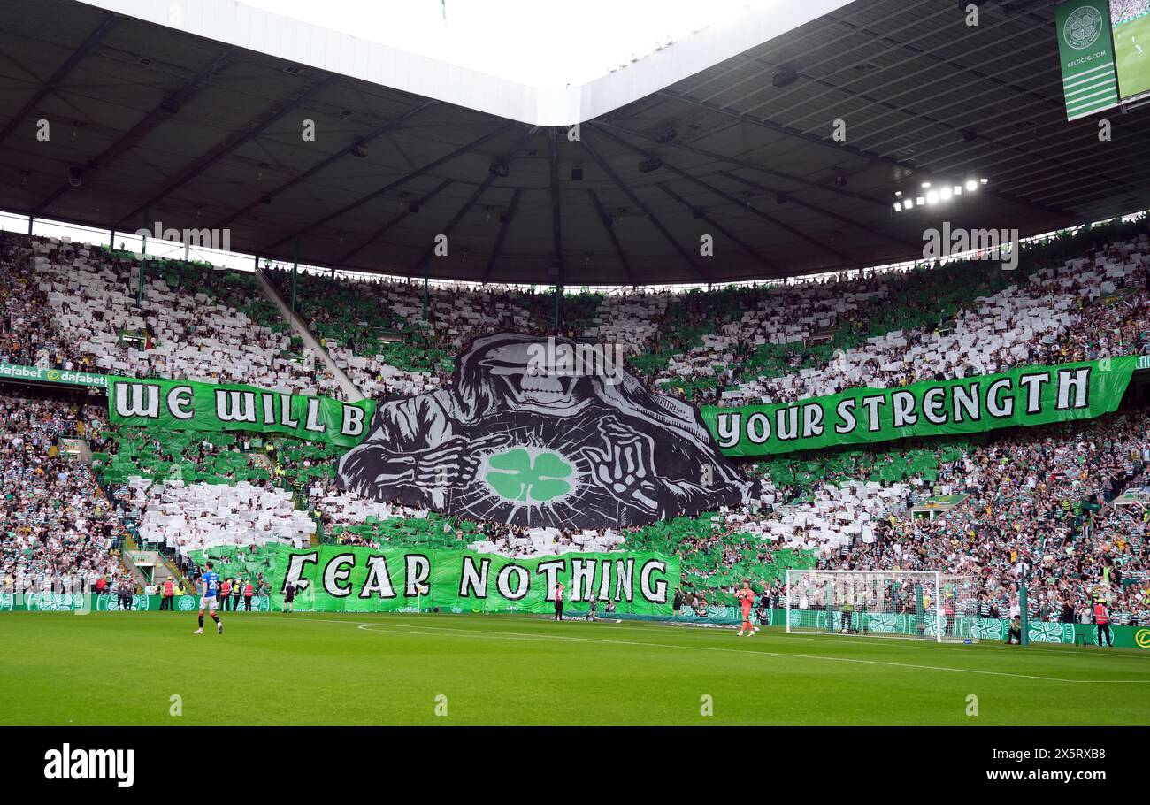 Celtic fans display a banner ahead of the cinch Premiership match at ...