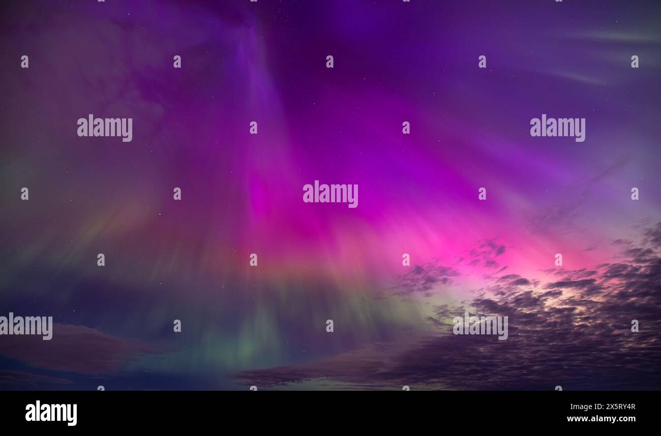 Colourful Northern Lights (Aurora Borealis) lighting up the sky on a ...