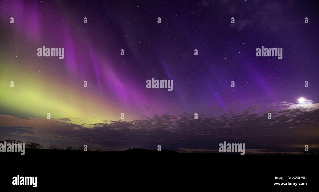 Colourful Northern Lights (Aurora Borealis) lighting up the sky on a ...