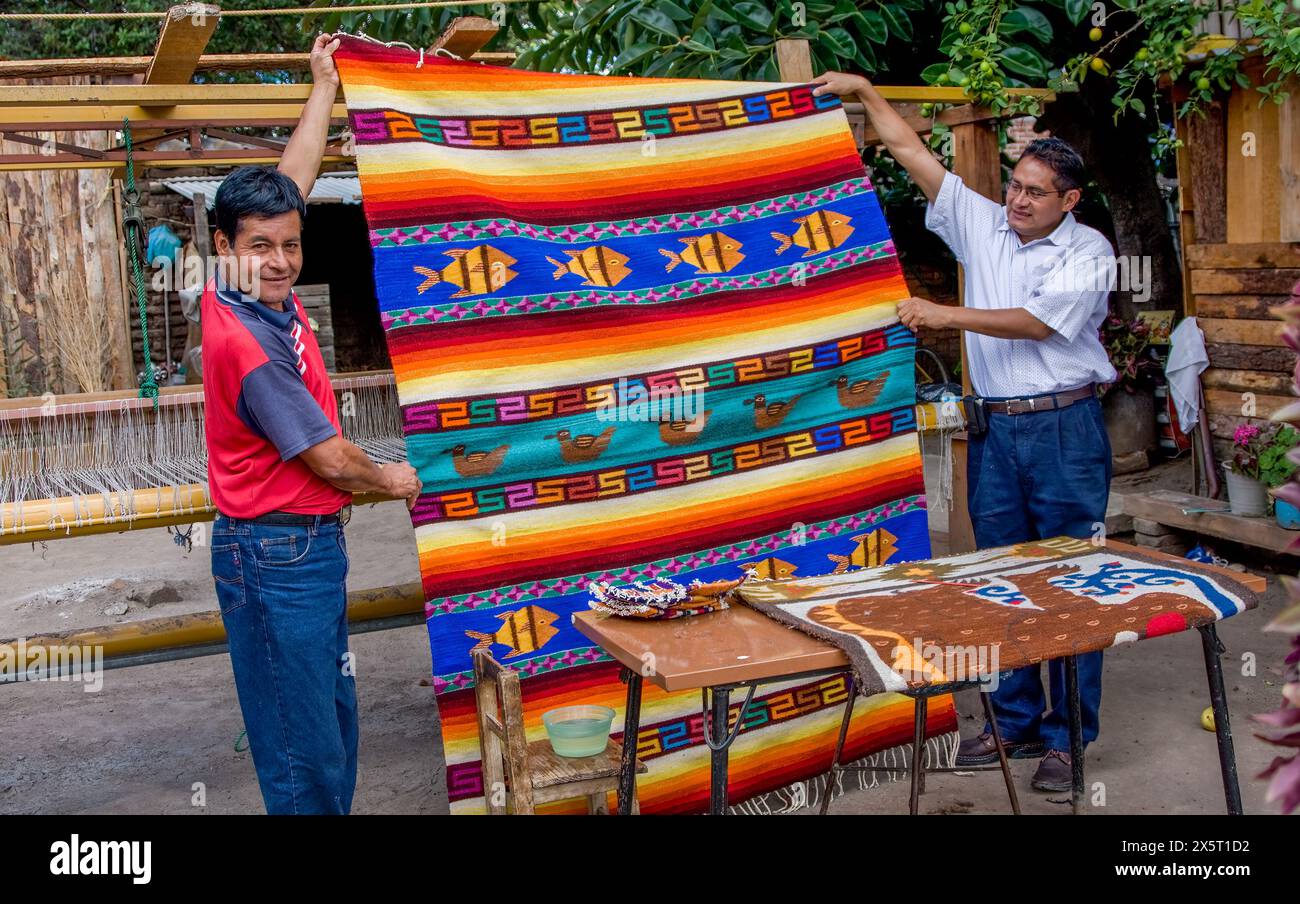 Santa Ana del Valle, Oaxaca, Mexico. Weaver Ernesto Martinez Cruz (left ...