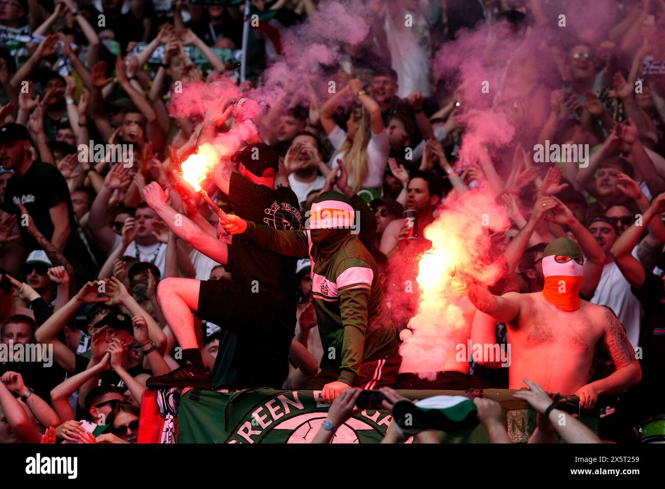 Celtic fans with flares during the cinch Premiership match at the ...