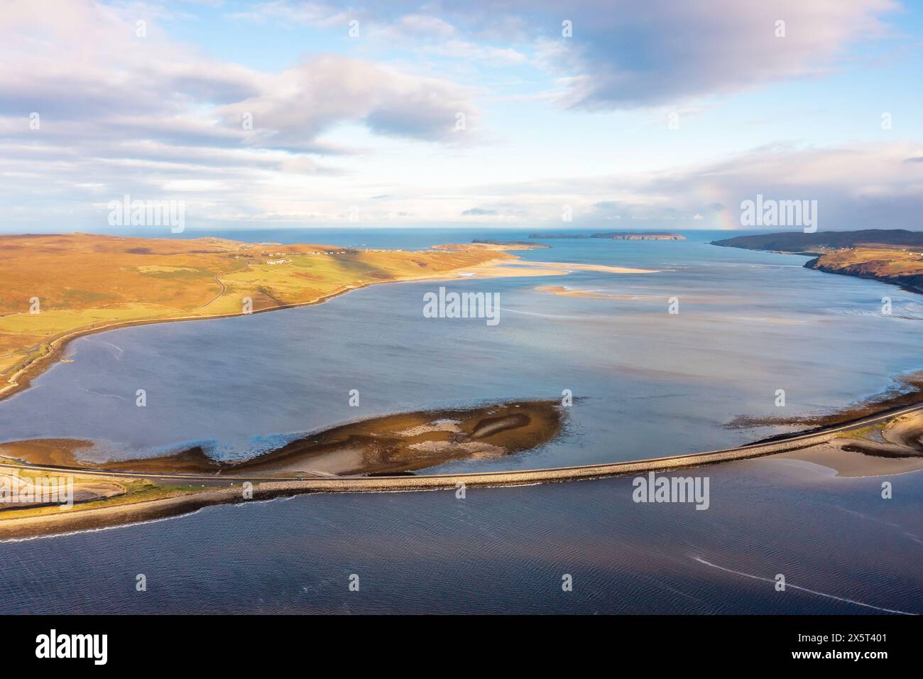 Drone view of river in scenic moor looking at cloud covered mountain in ...