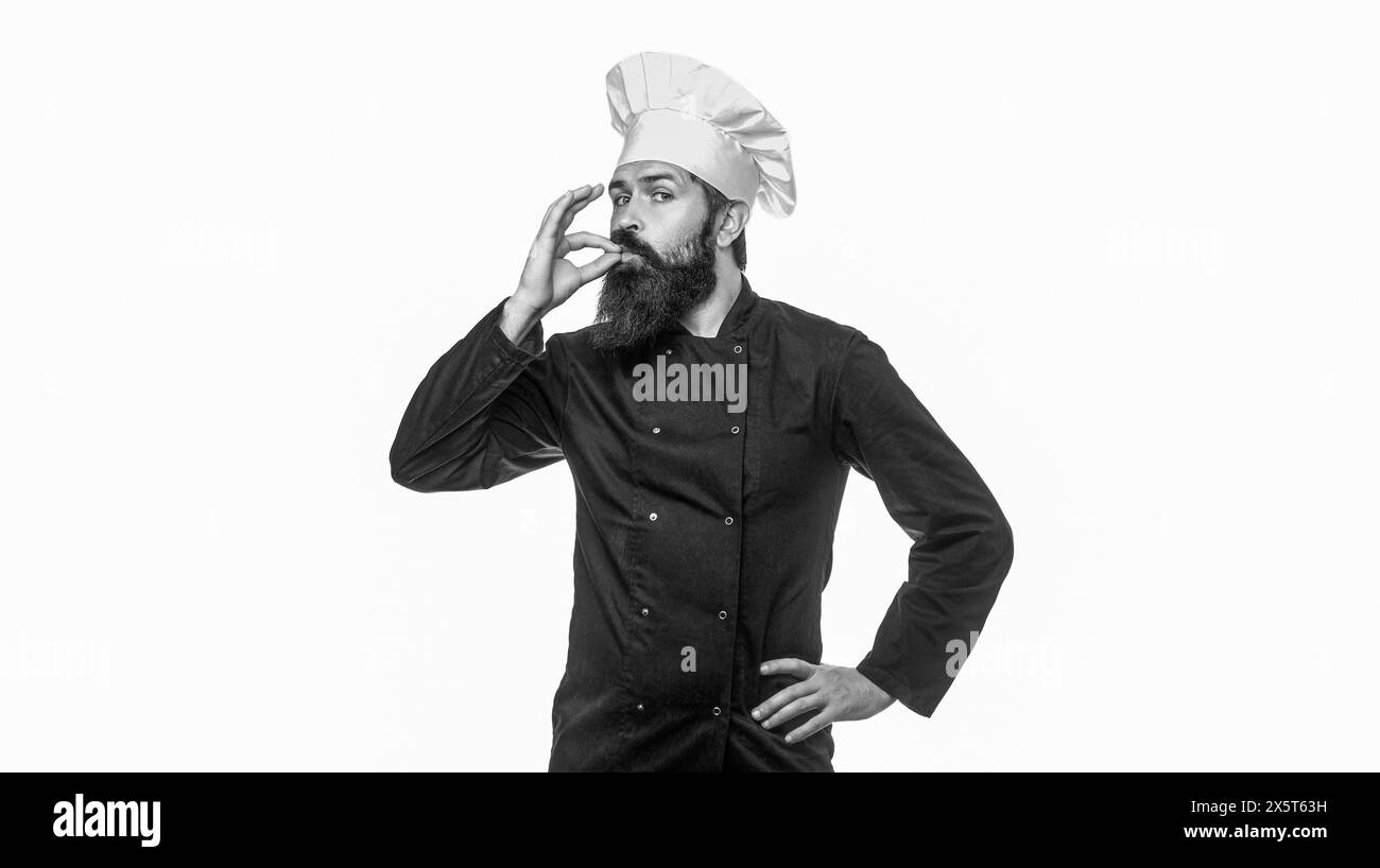 Professional chef man showing sign for delicious. Cook with taste ...