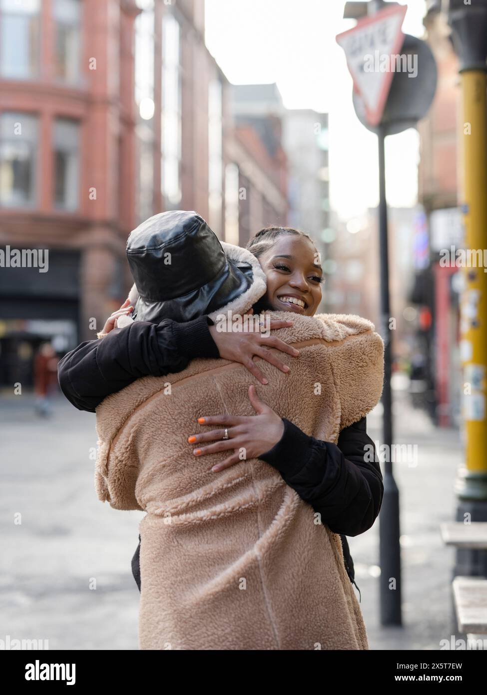 Two women hugging hi-res stock photography and images - Alamy