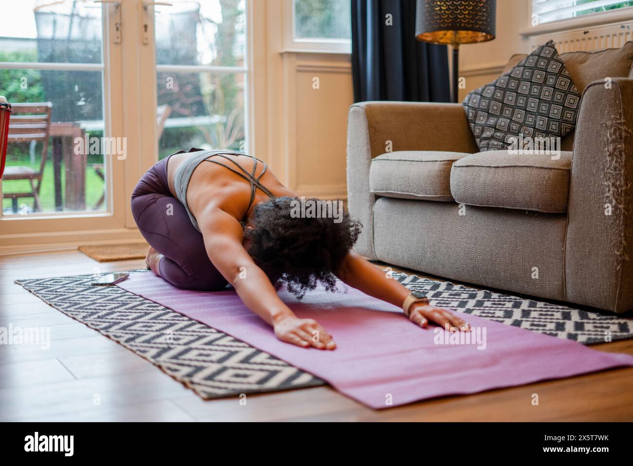 Young woman practicing childs hi-res stock photography and images - Alamy