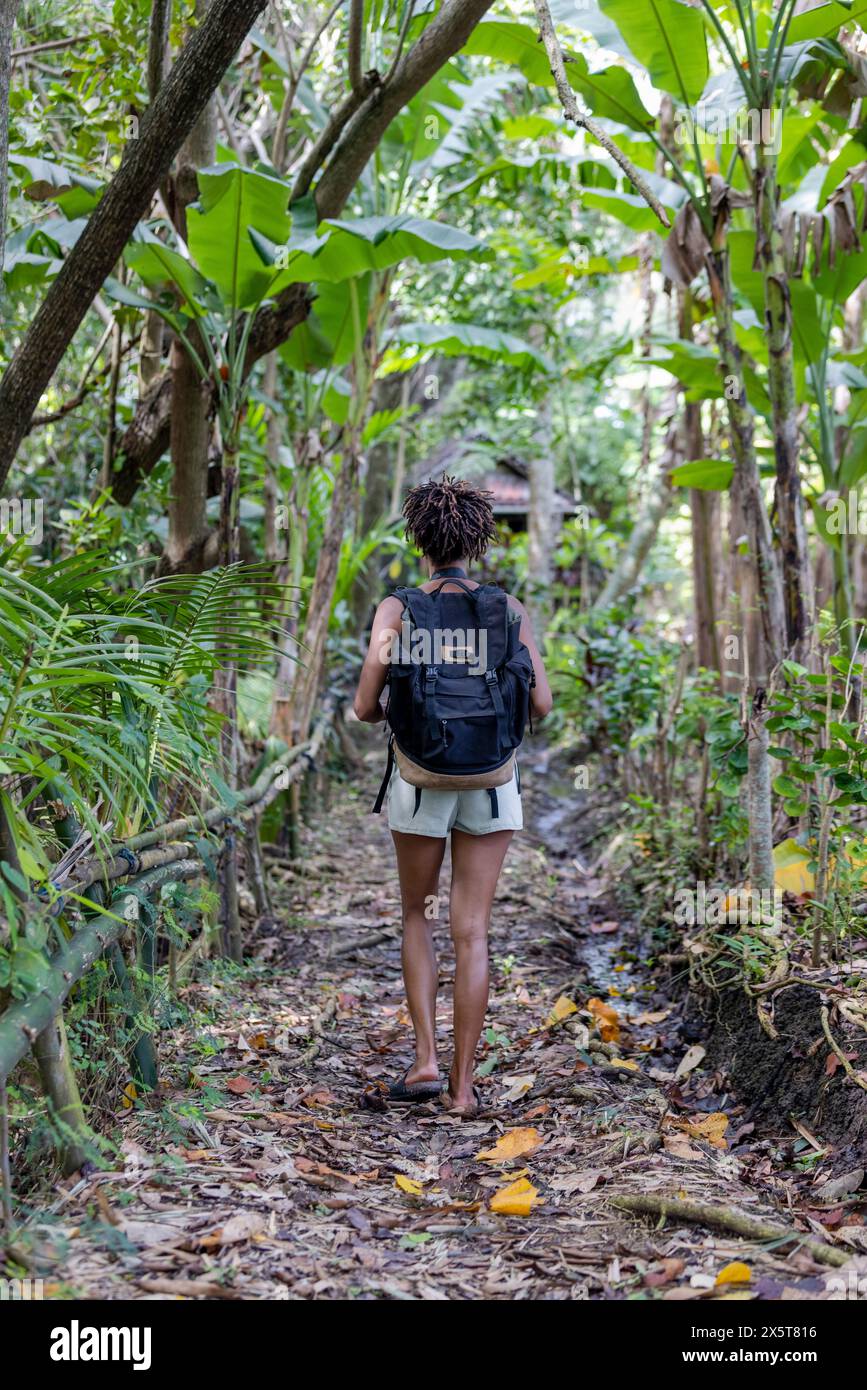 Young woman in tropical rainforest hi-res stock photography and images ...