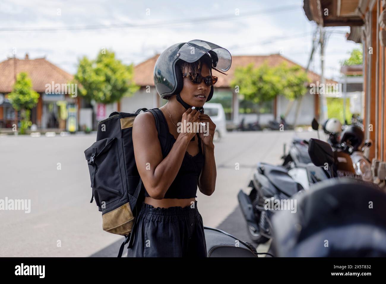 Woman wearing sunglasses helmet hi-res stock photography and images - Alamy