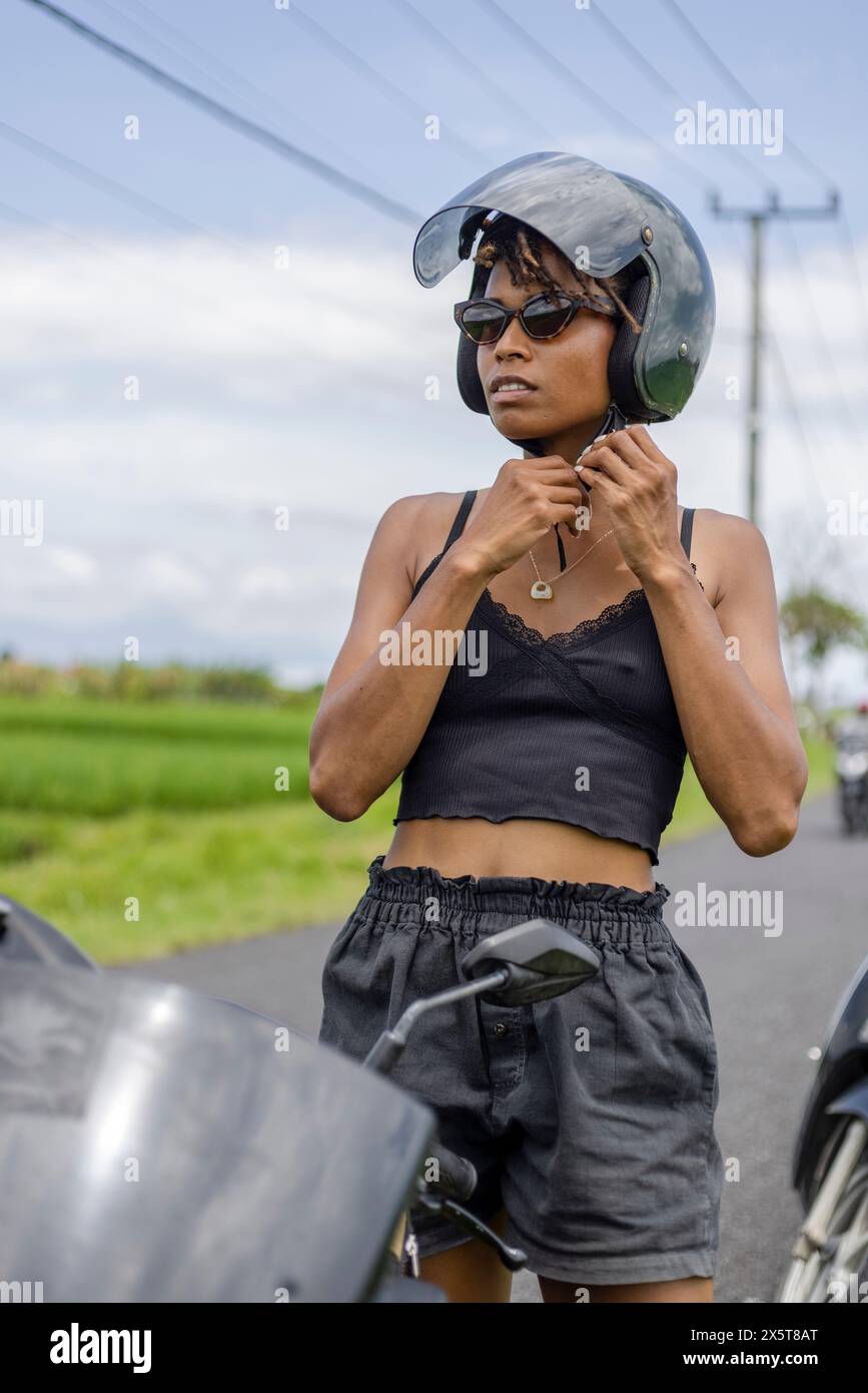 Motorcycle woman with sunglasses and helmet hi-res stock photography ...