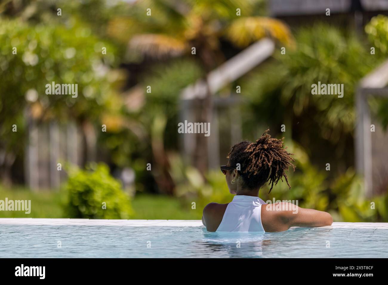 Woman swimsuit rear view hi-res stock photography and images - Alamy