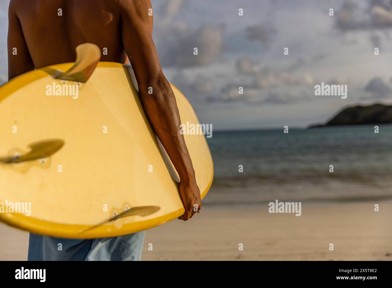 Surfer standing surfboard on hi-res stock photography and images - Alamy