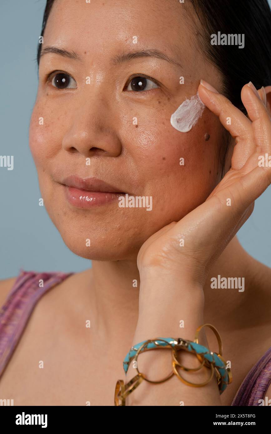 Woman freckle cream hi-res stock photography and images - Alamy