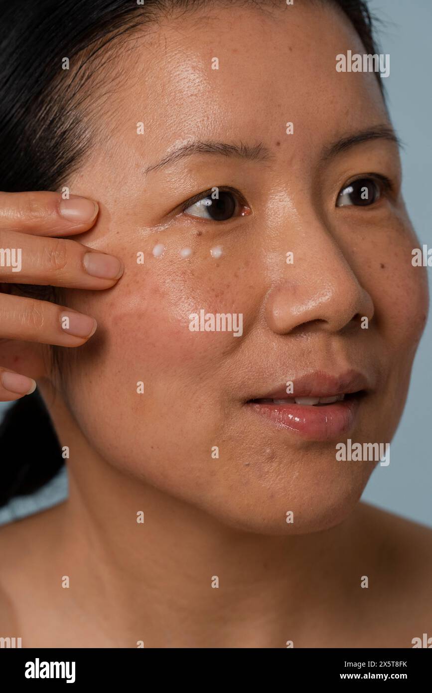 Skin cream under eyes hi-res stock photography and images - Alamy