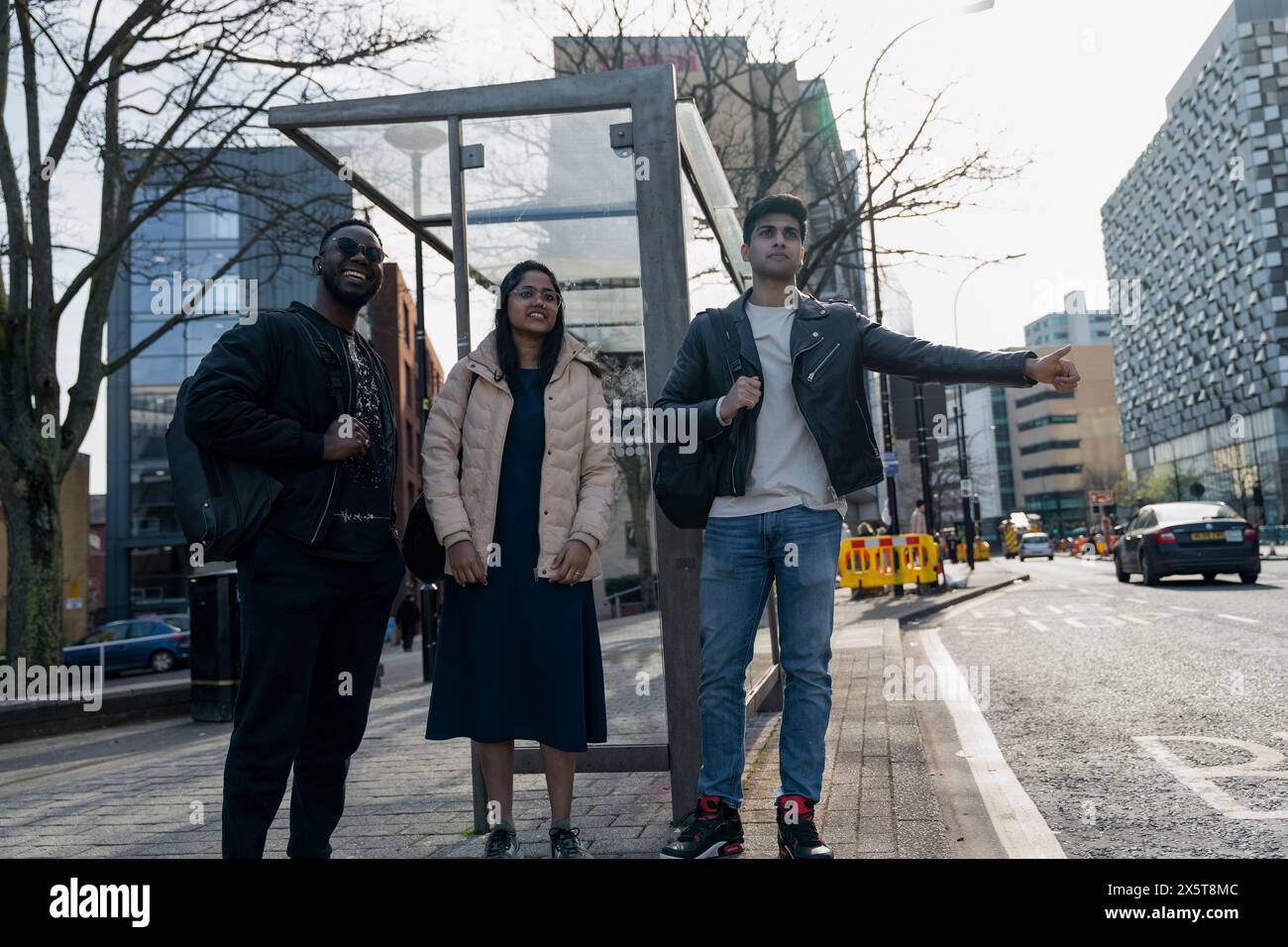 Young students bus hi-res stock photography and images - Alamy