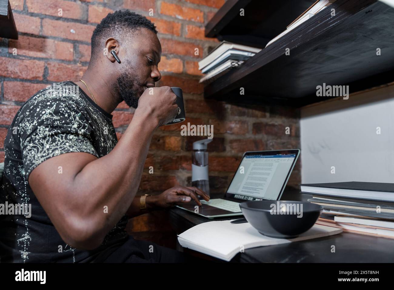University student studying in dorm hi-res stock photography and images ...