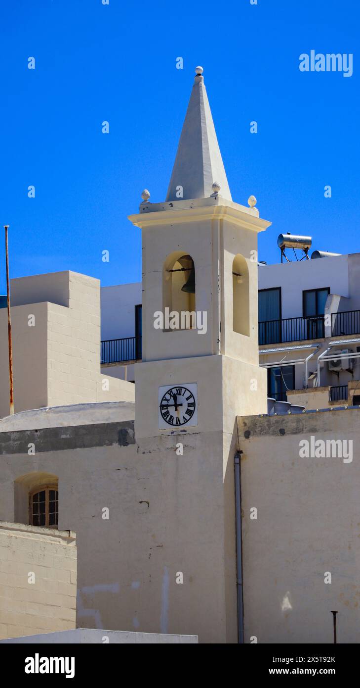 The bell and clock tower of St Paul's church, Marsalforn, on the ...