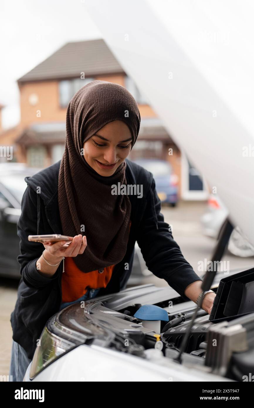 Young asian woman wearing smart hi-res stock photography and images - Alamy