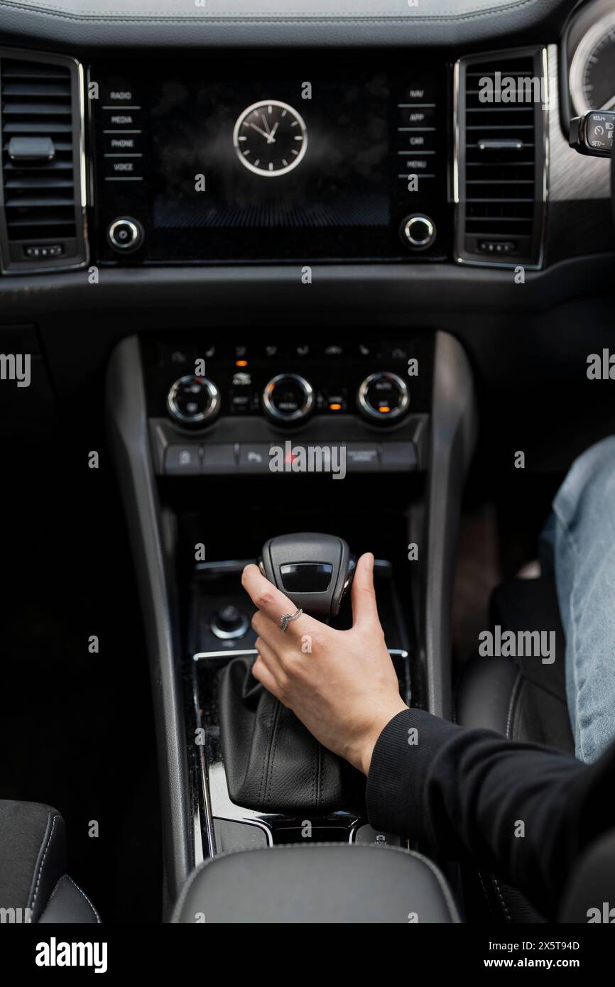 Hand woman changing gear driving hi-res stock photography and images ...