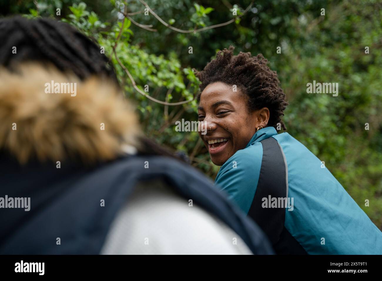 Mother and daughter talking during walk in park Stock Photo - Alamy