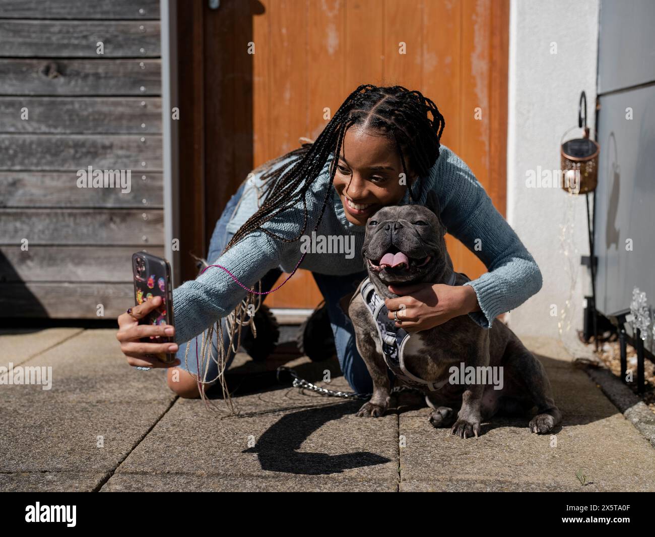 Woman taking selfie on sunny hi-res stock photography and images - Alamy