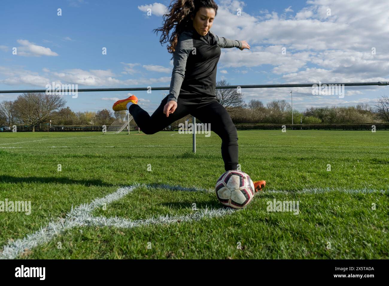 Soccer ball kick woman hi-res stock photography and images - Alamy