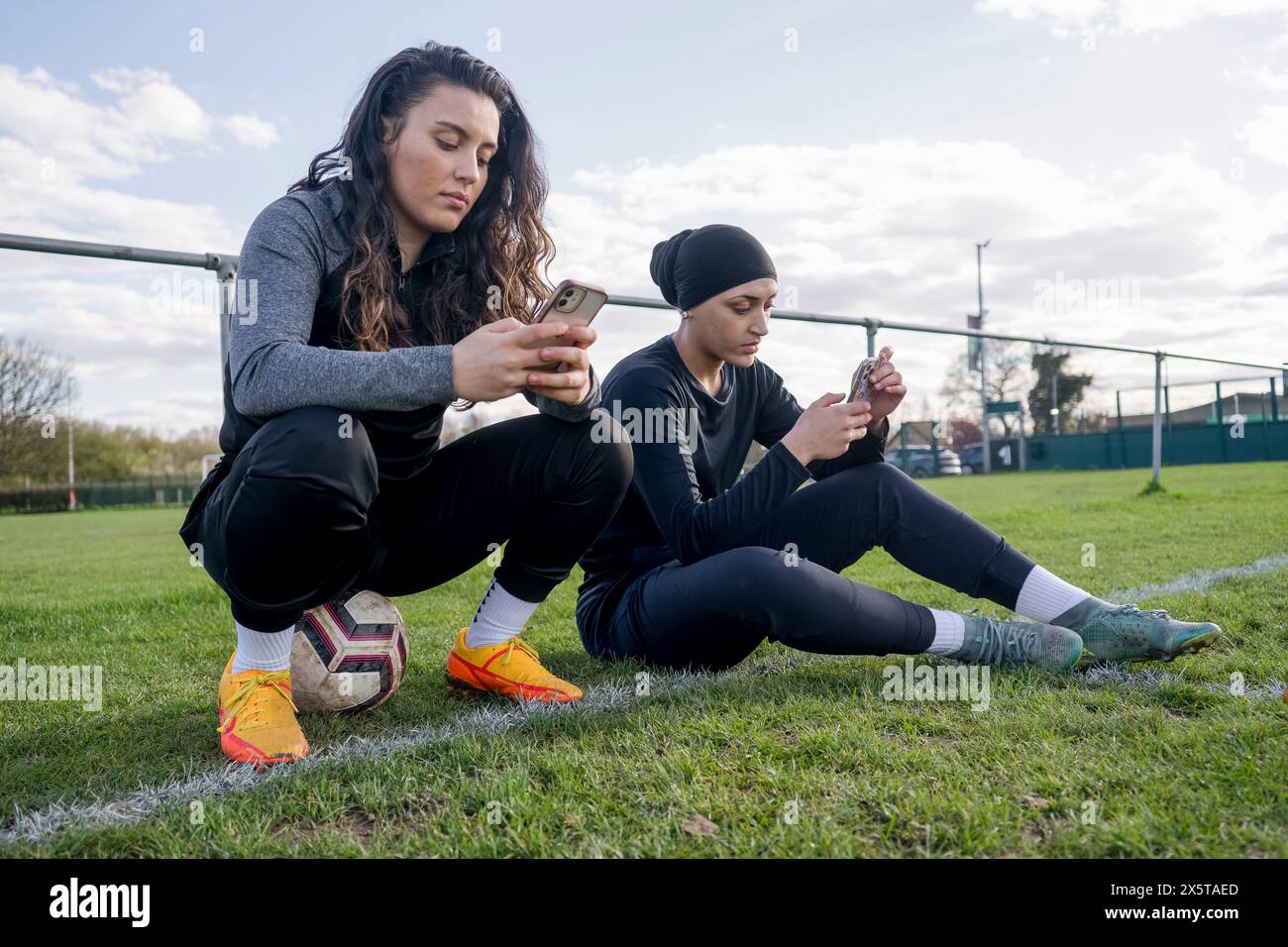 Soccer player using phone hi-res stock photography and images - Alamy