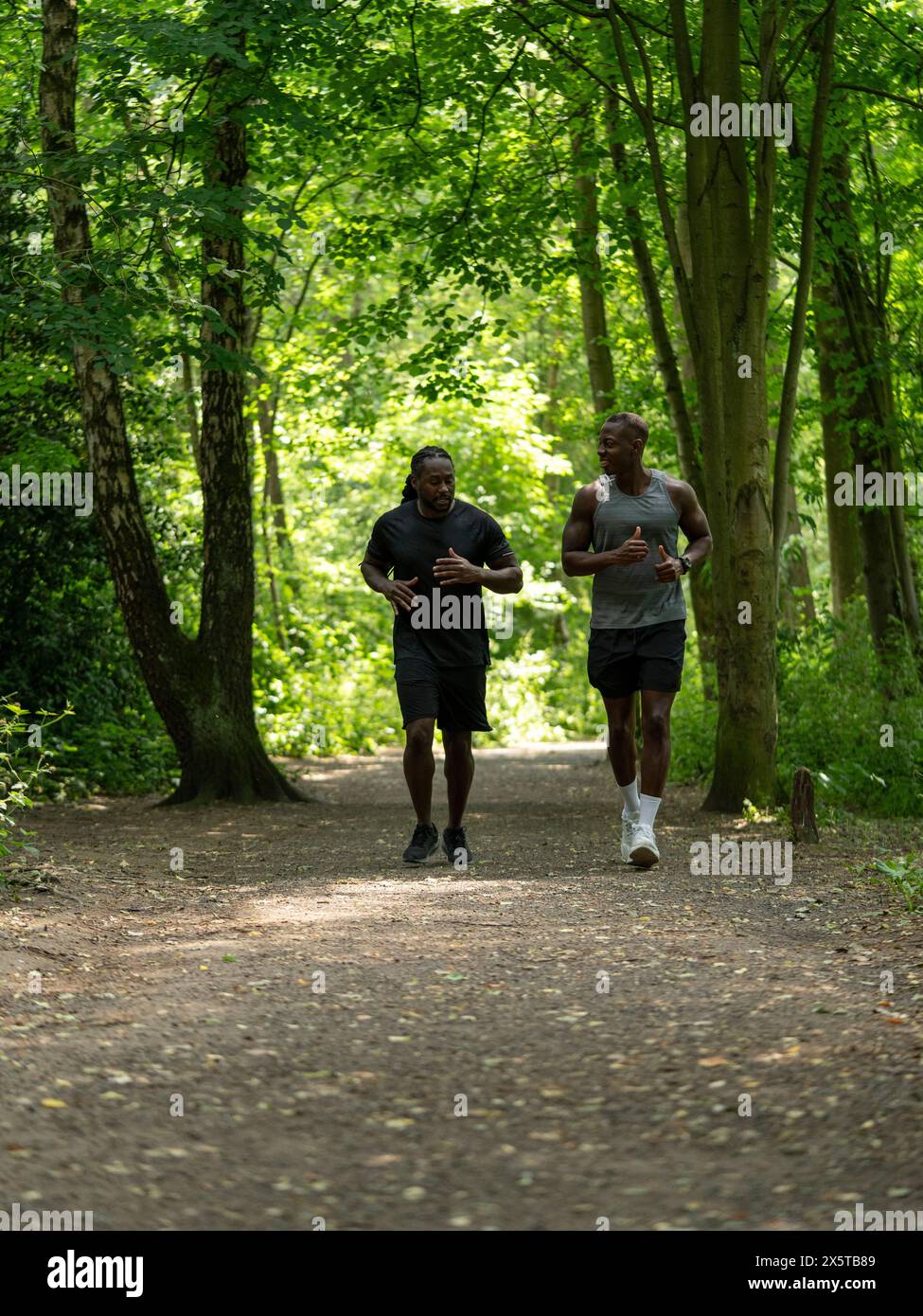 Two men jogging in hi-res stock photography and images - Alamy