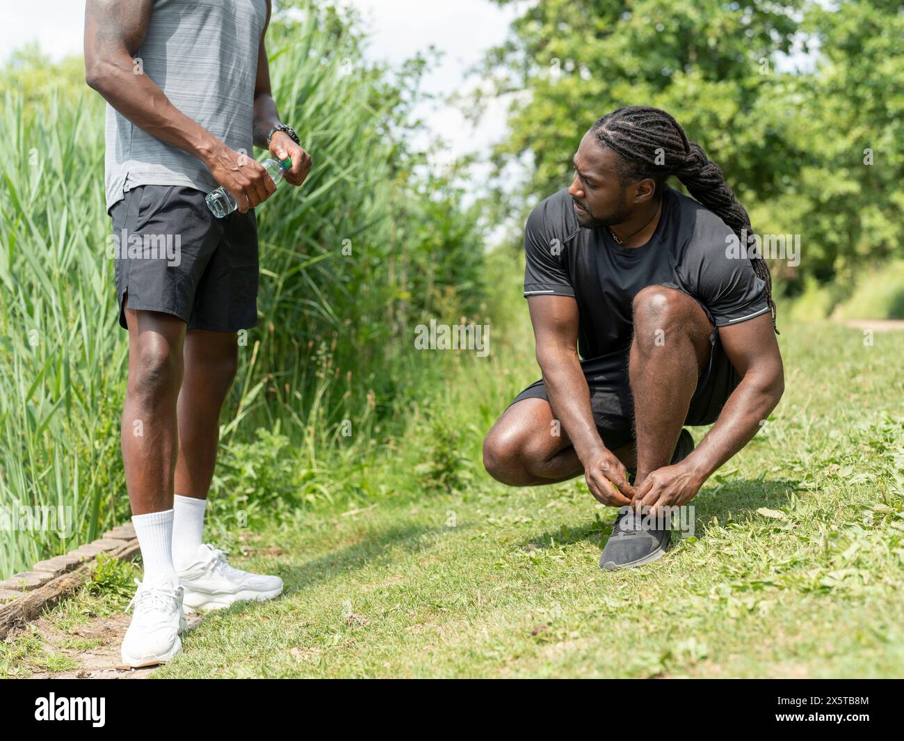 People exercising outdoors in park hi-res stock photography and images ...