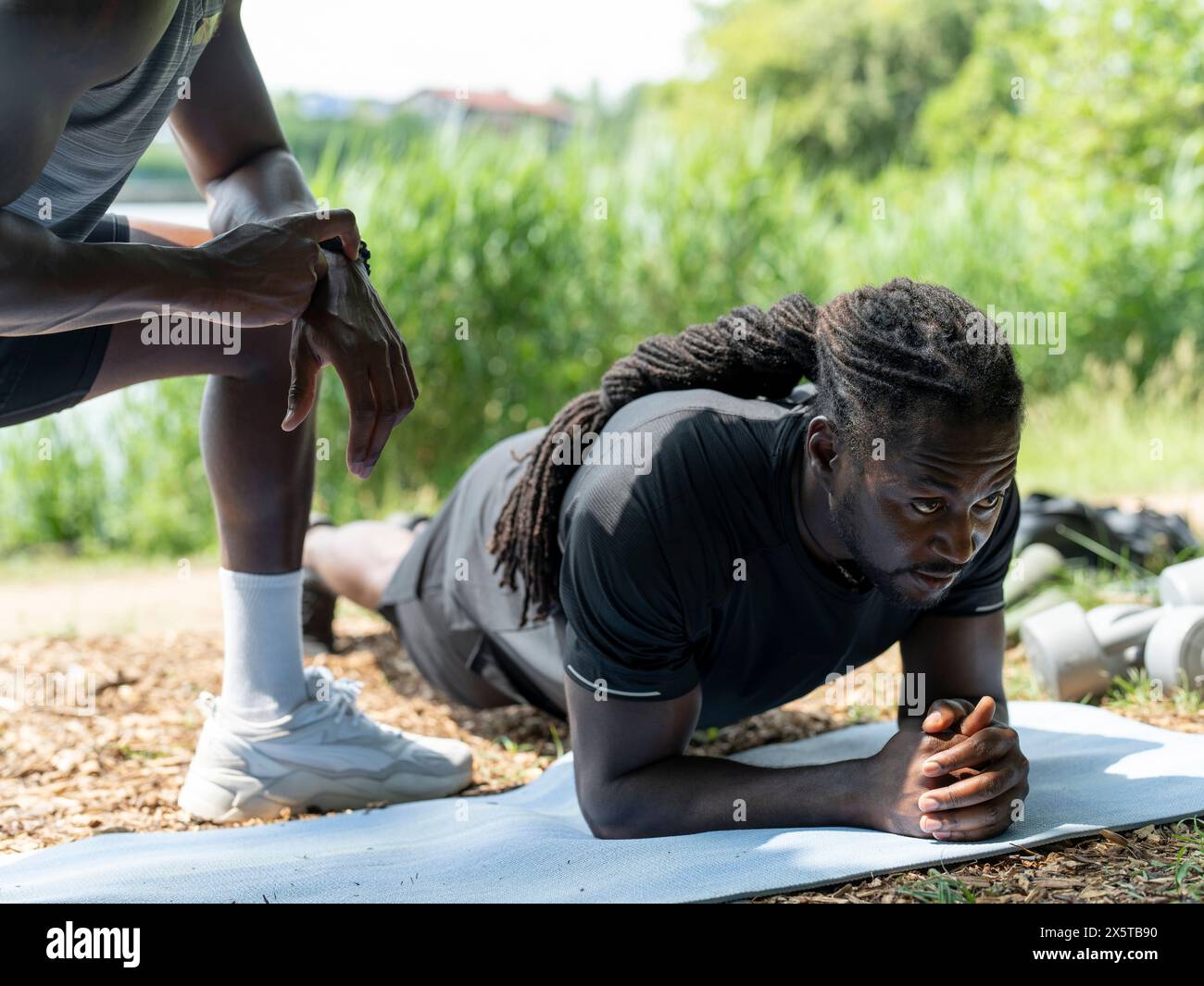 Black personal trainer hi-res stock photography and images - Alamy