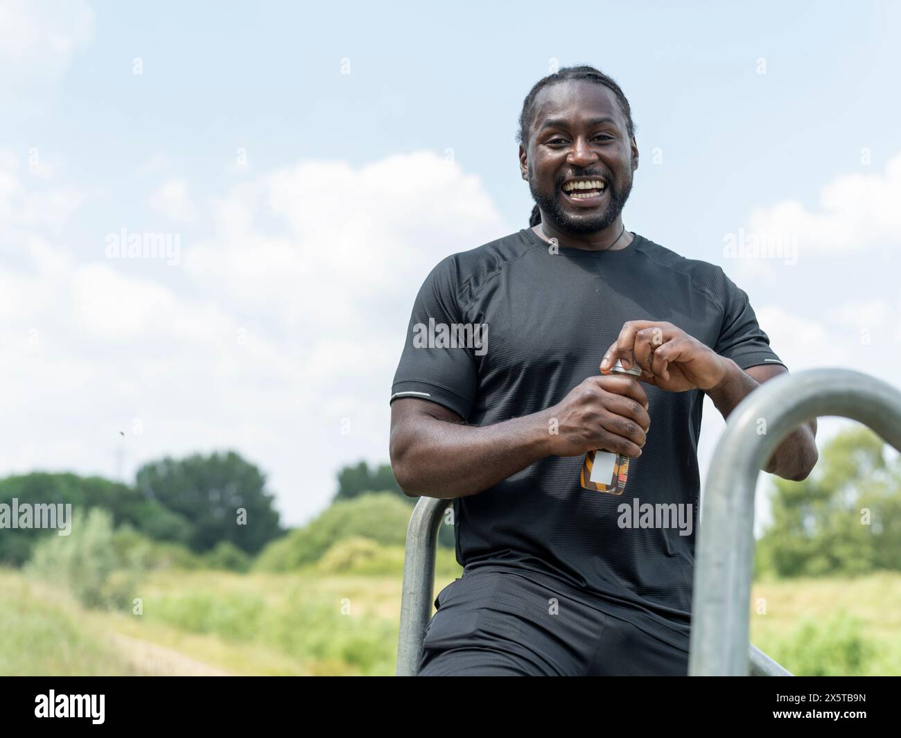 Man drinking protein drink during workout Stock Photo - Alamy